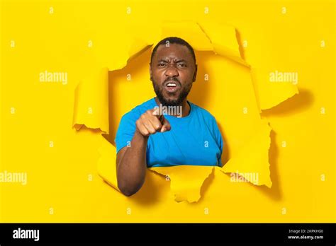 Aggressive Black Man Pointing Finger Looking At Camera Blaming You
