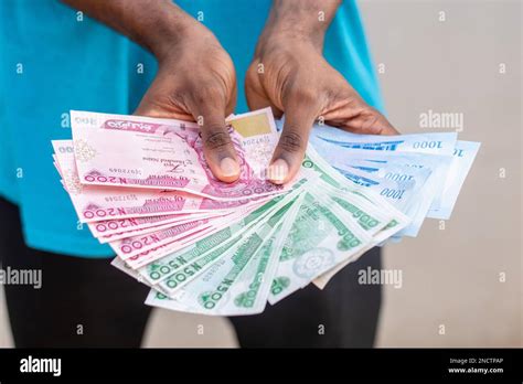 Person Holding The New Nigerian Naira Notes Stock Photo Alamy