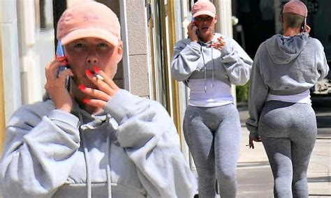 Amber Rose Shows Her Curves In Grey Sweatsuit With Tight Leggings While Out For Lunch In Los Angeles