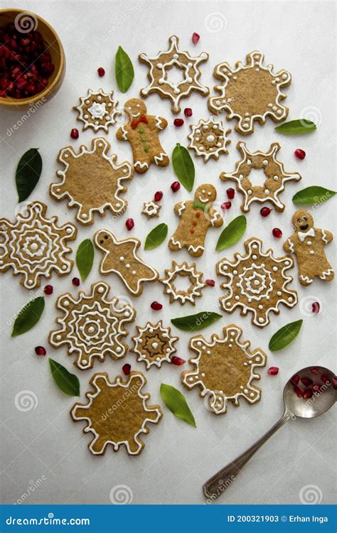 Christmas Ginger Cookies Snowflake Shape Icing Cream With Pomegranate