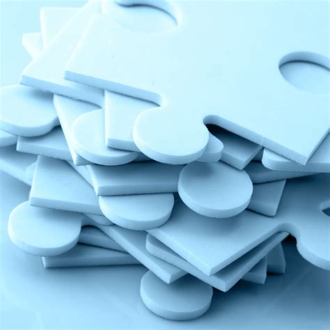 Premium Photo Stack Of Jigsaw Puzzle Pieces
