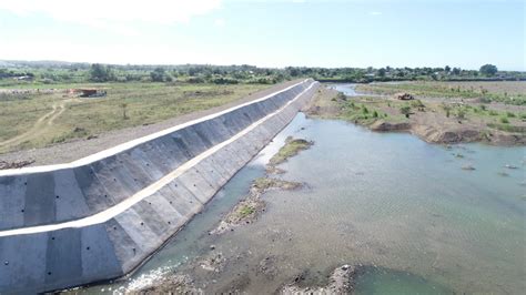 DPWH Constructs Flood Control Structure Access Road In Ilocos Norte