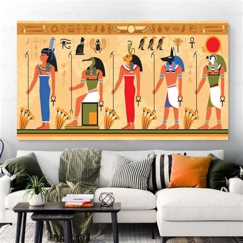 An Egyptian Painting On The Wall Above A Couch In A Living Room With