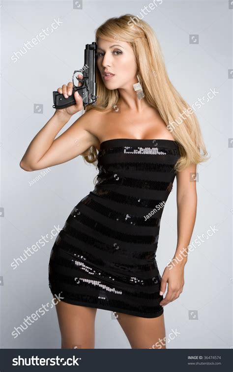 Sexy Woman Holding Gun Stock Photo 36474574 Shutterstock