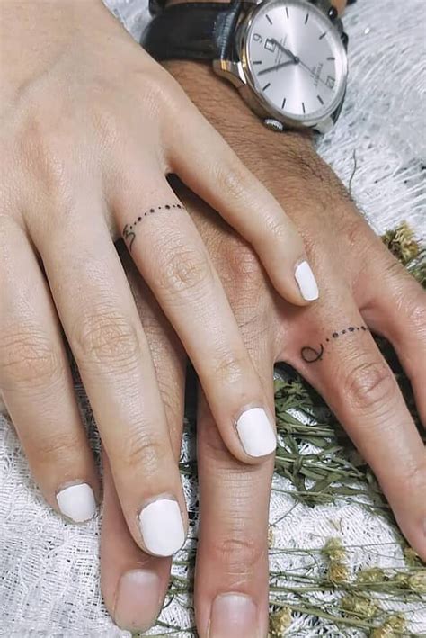 Female Ring Finger Tattoo