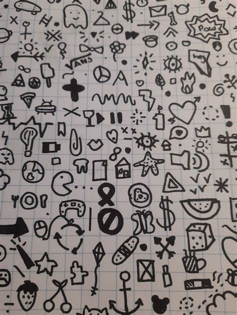A Sheet Of Paper That Has Some Drawings On It With Writing And Symbols