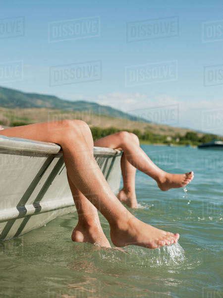 Girls 6 7 8 9 Resting On Boat Stock Photo Dissolve