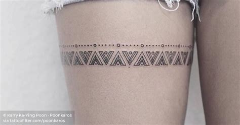Ornamental Thigh Band Tattoo