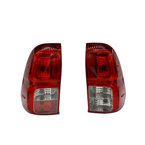 Juego De Faros Traseros Hilux Tipo Koito Valeo Con Porta