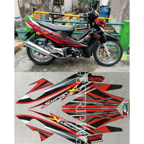 Jual STIKER SUPRA X 125D MERAH TAHUN 2008 2009 STRIPING LIS STANDAR ORI
