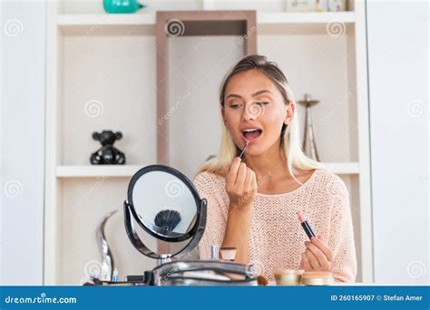 Beauty Woman Applying Makeup Beautiful Girl Looking In The Mirror And