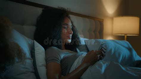 African American Woman Lying On Bed Night Nightfall Dark Home Bedroom Frightened Girl Scared Of