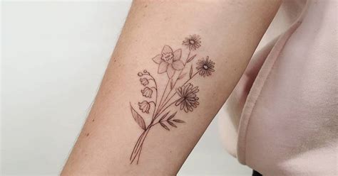 Fine Line Flower Bouquet Tattoo Placed On The Inner