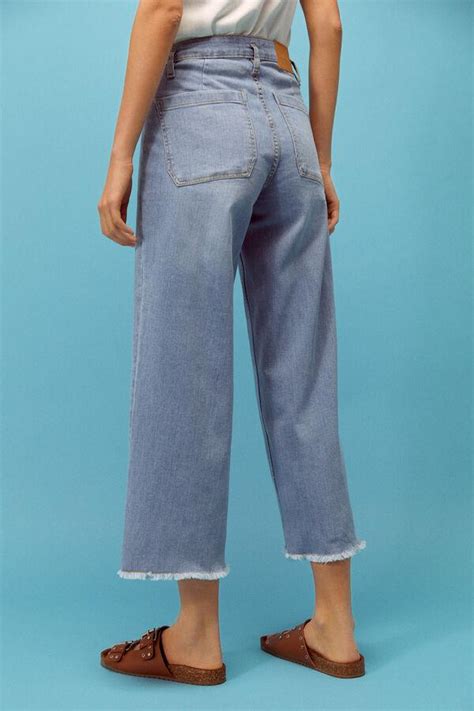 11 pantalones de tiro alto que te harán parecer más alta porque alargan