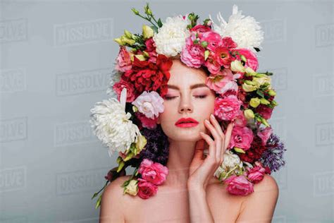 Portrait Of Beautiful Naked Woman With Closed Eyes Posing In Floral