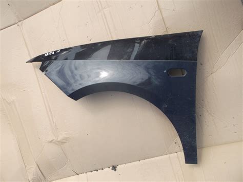 Seat Ibiza IV Blotnik Lewy Przedni Kolor LC9Z 9400806124 Oficjalne