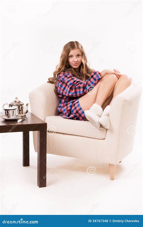 Attractive Woman Sitting On A Armchair Stock Photo Image 34767348