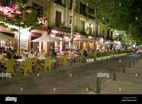 Sidewalk Cafes And Restaurants At Night Plaza Santa Ana Madrid Spain