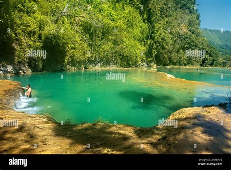 Tourists Enjoying The Beautiful Pools Of Semuc Champey Rio Cabohon