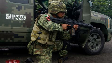 Elementos De SSP Sedena Y GN Confiscan Armas De Fuego Y Municiones
