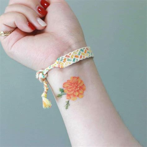 10 Best Small Flower Tattoos On Wrist That Will Blow Your Mind