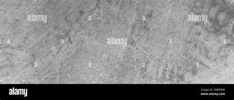 La texture du mur en béton de grunge avec des taches sales peut être