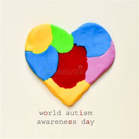 Autism Awareness Day Concept With Puzzles Brain Symbol And Color