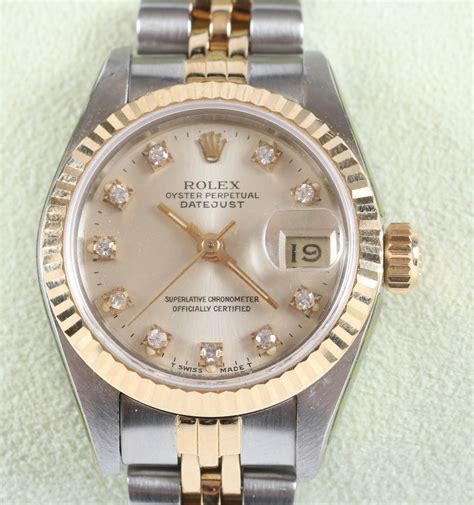 Rolex Datejust dameur model 69173 af 18 kt guld stål Auktionshuset