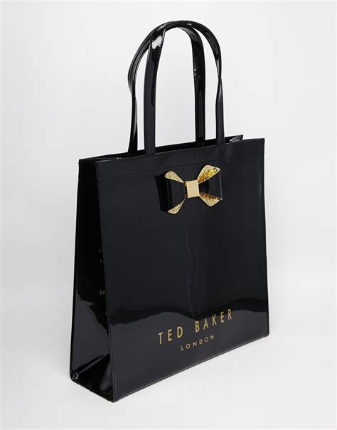 Lyst Ted Baker Crystal Bow Large Icon Bag In Black