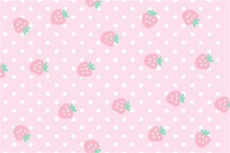 A Pink Background With White Polka Dots And Strawberries