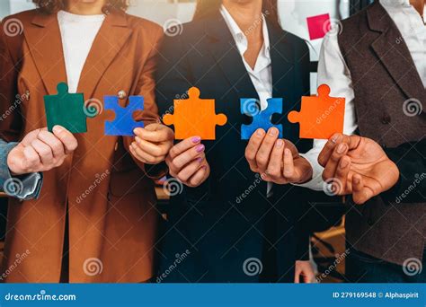 Teamwork Of Partners Connect Puzzle Pieces As Integration And Startup