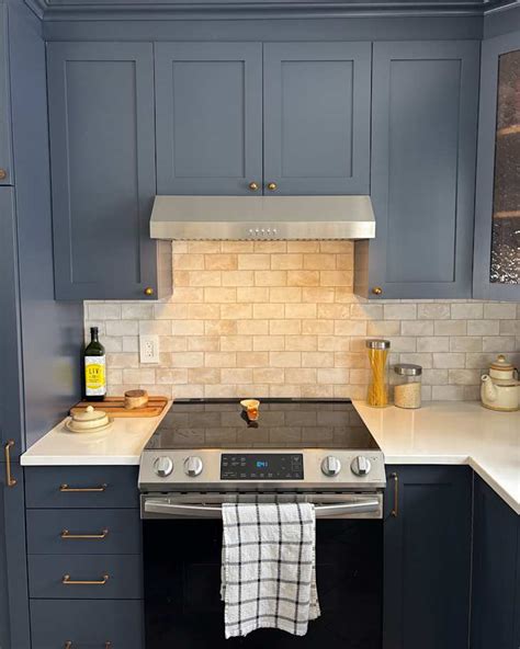 A Kitchen Makeover Transforms Very Orange Cabinets W Navy Paint