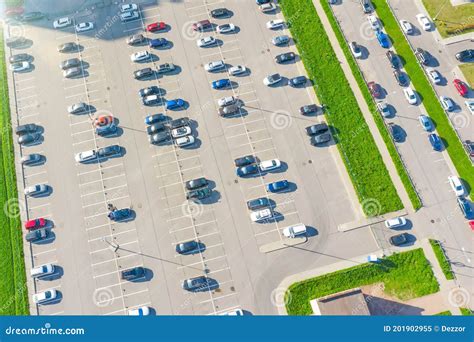 Aerial Top Down View Of The Parking Lot With Many Cars Of Supermarket