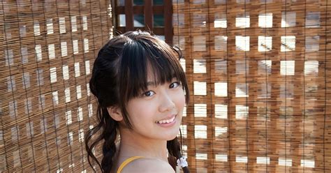 Koharu Nishino Japanese Gravure Idol Sexy Orange Swimsuit Playing Water
