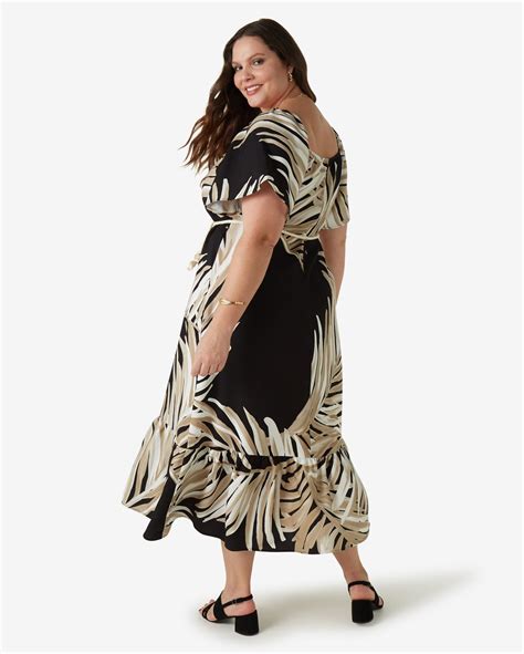 Riachuelo Vestido Mídi Plus Size Feminino Evasê Manga Curta Bufante
