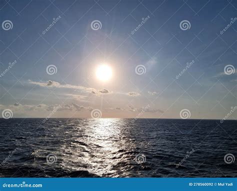 The Sun Shines Brightly Over The Ocean Stock Photo Image Of Morning