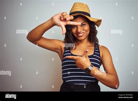 Beautiful Transsexual Transgender Woman Wearing Summer Hat Over Isolated White Background