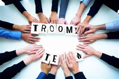 Premium Photo Hands With Letters Forming The Word Teamwork