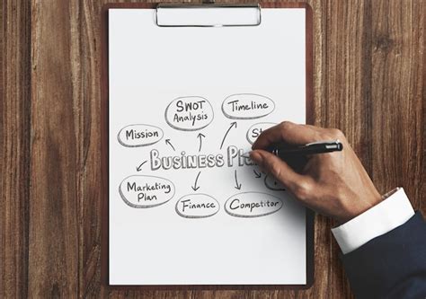 Businessman Drawing A Business Plan Premium Photo