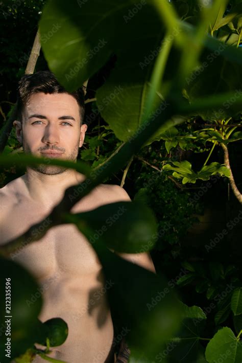 Good Looking Handsome Naked Man With Blue Eyes And Beard Stands