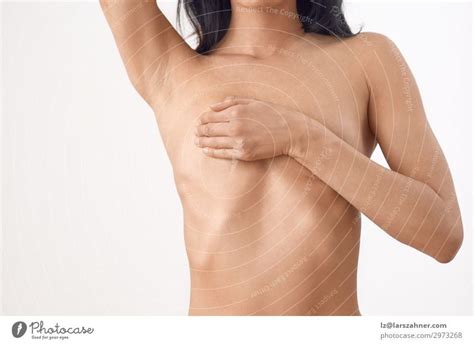Torso Of A Slender Middle Aged Naked Woman A Royalty Free Stock Photo