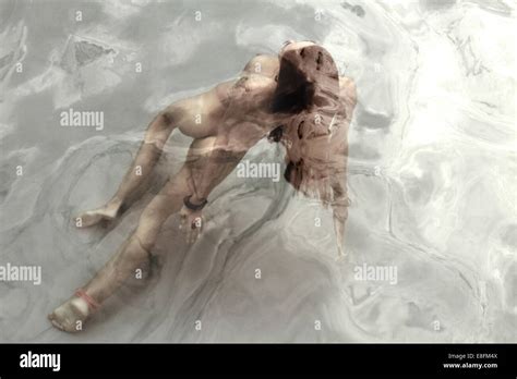Naked Women Swimming Underwater