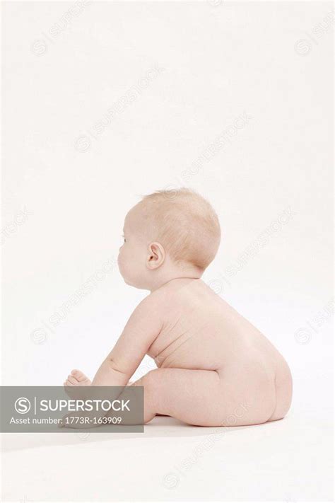 Nude Baby Boy Sitting On Floor Superstock