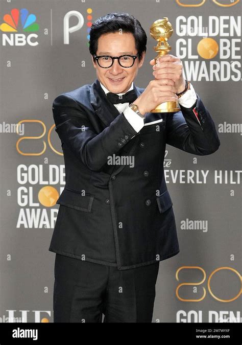 Ke Huy Quan Poses With The Best Supporting Actor In A Motion Picture