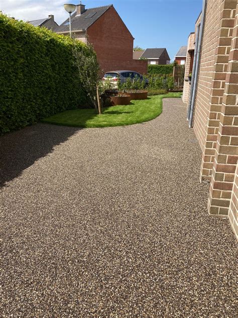 De Tuinman Aanleg Van Tuin Met Verhoogde Bloemborders En Moderne