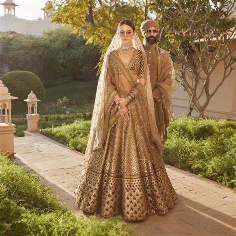Classic Golden Color Thread Work Bridal Lehenga Choli Atelier Yuwa