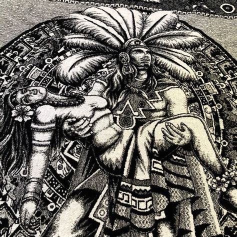 Aztec Guy Holding Girl