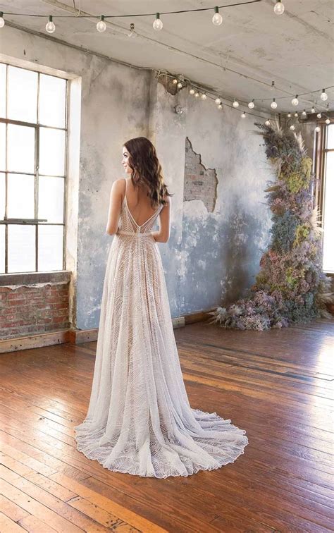 Edgy Lace Boho A Line Wedding Dress With Plunging Neckline And