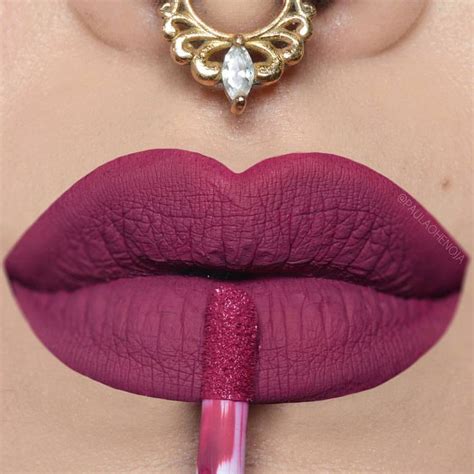 A Woman S Lips And Nose Ring Are Shown