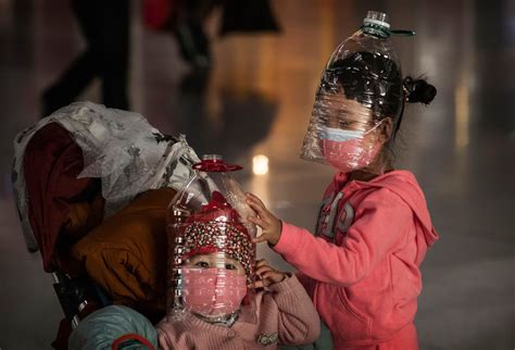 The Defining Photos Of The Pandemic And The Stories Behind Them
